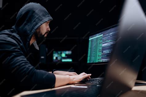 Premium Photo Hacker Committing Cybercrime