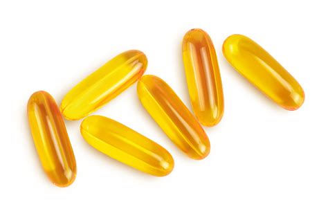 클리핑 경로와 전체 깊이의 필드가 있는 흰색 배경에 분리된 생선 기름 캡슐 맨 위 보기입니다 플랫 레이 0명에 대한 스톡 사진 및 기타 이미지 Istock