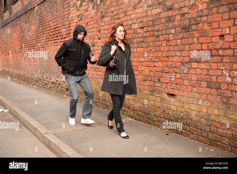 Male Stalking Lone Female To Steal Handbag Posed By Models Fully