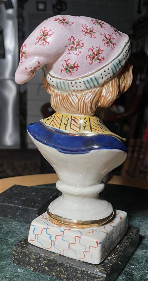 34 Bust Of A Cherubic Boy Glazed And Gilded Porcelain Collectors
