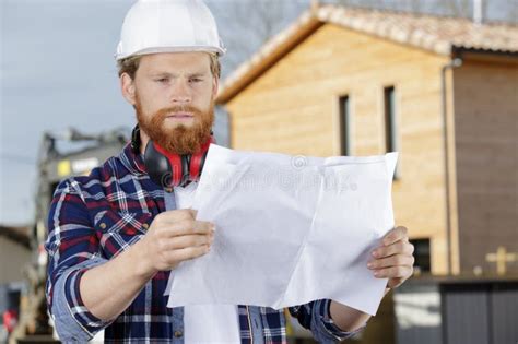Builder Man Checks Plans Project Stock Image Image Of Plan Engineer 332671193