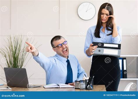 Angry Boss Firing Employee Woman Shouting Angrily Sitting In Office
