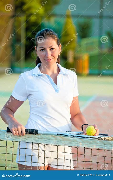 Girl With A Ball And A Tennis Racket At The Net Worth Stock Image Image Of Pursuit Adult