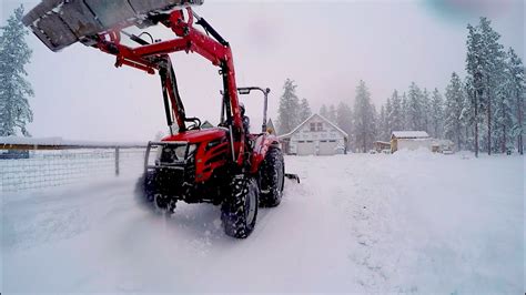 Plowing Snow With A Mahindra Tractor And A Rear Blade YouTube