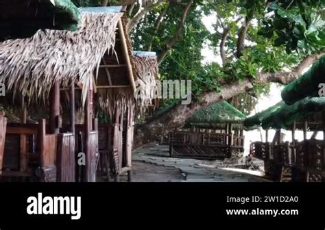 Slow Footage Of Nipa Huts On Also Known As Bahay Kubo At A Beach In The