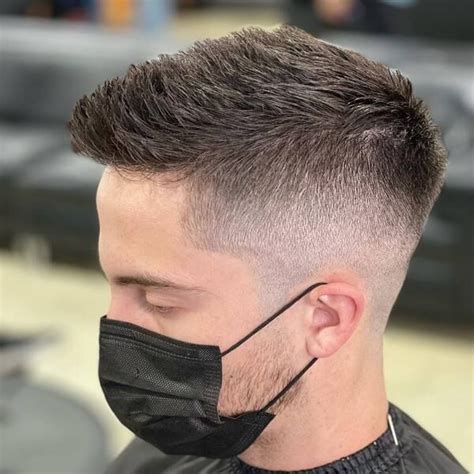 50 Best Mid Fade Haircuts For Men In 2022 Faqs Included Mid Fade Haircut Mens Haircuts Fade