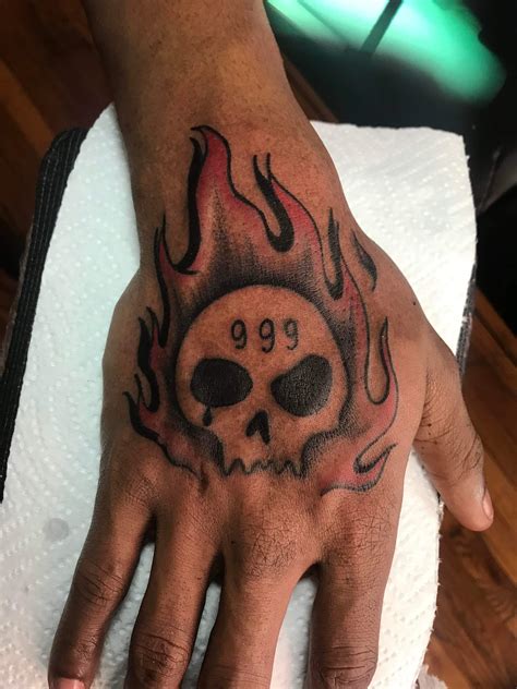 Skull With Flames Tattoo