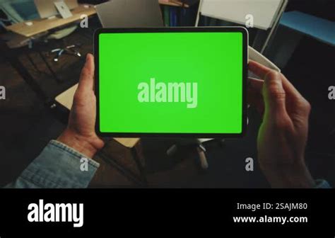 Close Up Hands Man Holding Scrolling A Tablet Computer With A