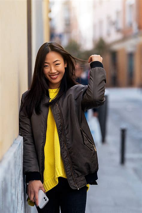 Portrait Of A Chinese Woman Smiling Del Colaborador De Stocksy