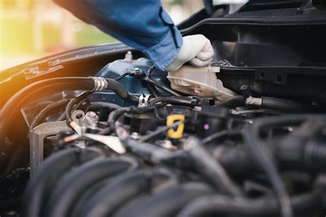 Premium Photo Close Up Of Hand Checking Auto Car Coolant Level