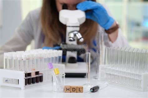 Indepth Laboratory Research On Hdl Cholesterol Conducted Under A Microscope For Analysis Stock