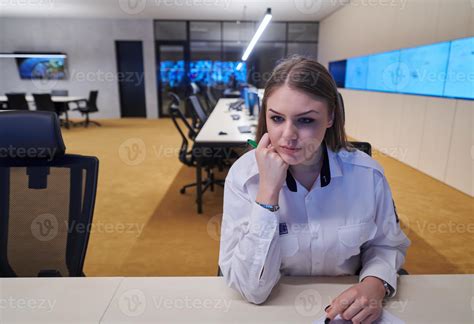 Female Operator Working In A Security Data System Control Room 10701573 Stock Photo At Vecteezy