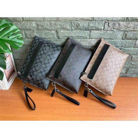 COACH CARRYALL POUCH IN SIGNATURE CANVAS Shopee Thailand
