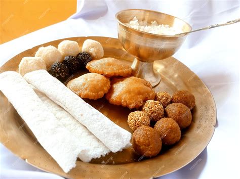 Premium Photo Assamese Traditional Food Items Like Pitha Laddu Doi