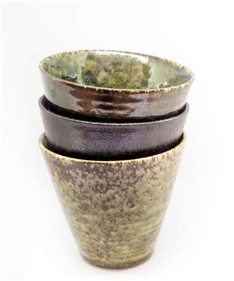 Three Ceramic Cups Of The Same Shape But The Pattern Is Different Stock