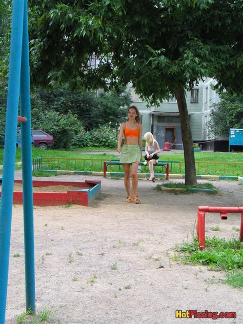 Lover Of Public Peeing Lifts Up Her Skirt And Leaks While Teetering