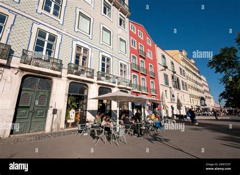 Buildings And Coffee Shops In Rua Dos Bacalhoeiros Pedestrian Area Lisbon Portugal Stock