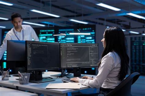 Premium Photo Software Developer Using Computer Optimizing Data