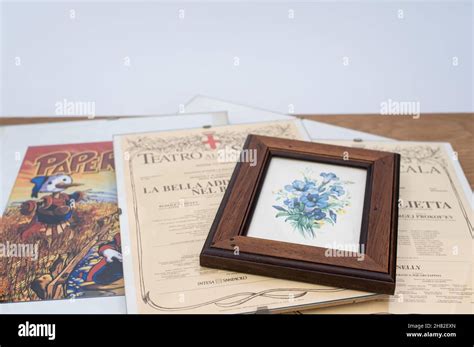 Glass Clip Frames With Posters On A Wooden Tabletop Background Stock