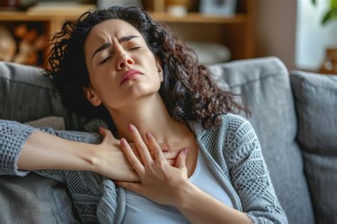 Premium Ai Image Woman Experiencing Heart Asthma Or Panic Attack At Home