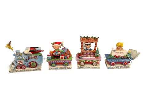 At Auction Jim Shore Peanuts Deluxe Train Set Of 4 6000987