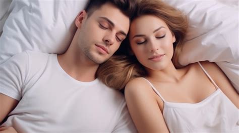 Premium Photo Young Loving Couple Sleeping Together In Bed