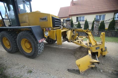 Road Grader Bulldozer Leveling The Settlements On The Road Editorial