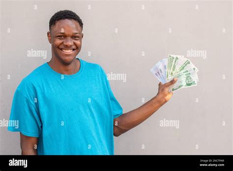 Person Holding The New Nigerian Naira Notes Stock Photo Alamy