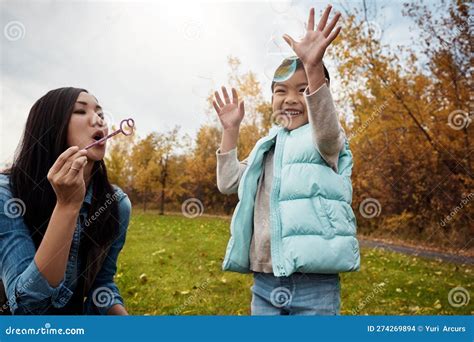 Shes Always Highly Entertained With Bubbles A Mother And Her Little
