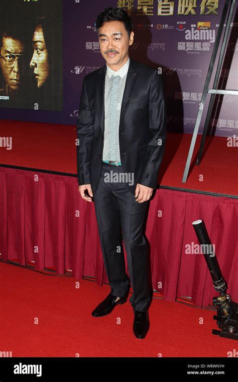 Hong Kong Actor Sean Lau Ching Wan Poses During A Premiere For His New Movie Overheard 3 In