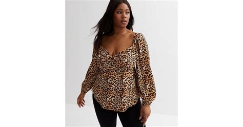 Curves Brown Leopard Print Twist Peplum Blouse New Look
