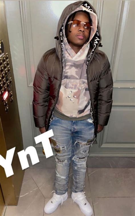 42 Dugg Wearing A Moncler Puffer With Amiri Hoodie And Jeans Inc Style