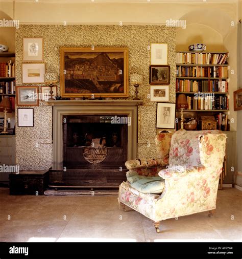 Floral Armchair In Living Room With William Morris Wallpaper Stock