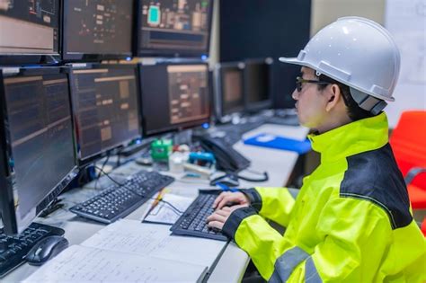 Premium Photo Inside The Large Industry Factory Female Computer Engineer Works On Personal