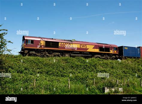 An Ews Class 66 Diesel Locomotive No 66030 Pulling A Freightliner