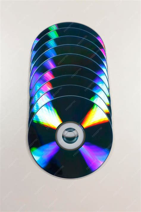 Premium Photo Background Of Compact Disks Or Dvds