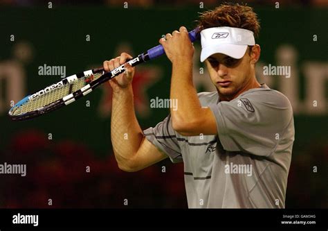 Andy Roddick Usa Pretends To Shoot Himself With His Racquet During