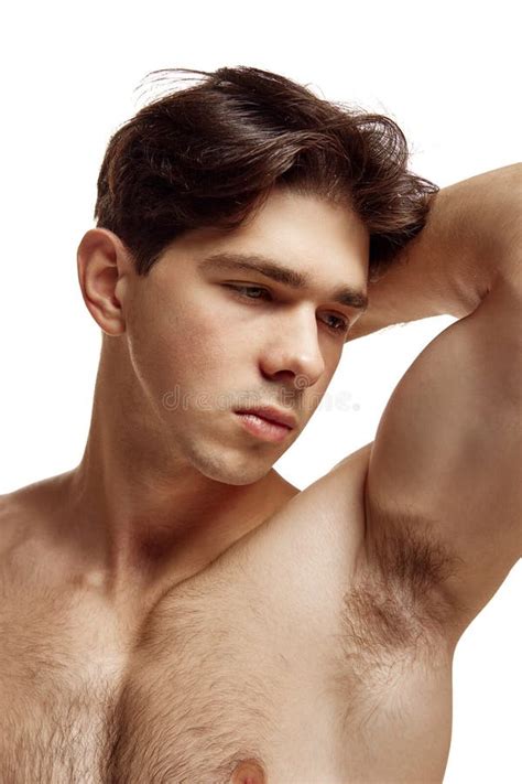 Close Up Portrait Of Attractive Brutal Young Man With Bare Shoulders