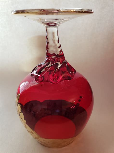 Ruby Glasses Antiques Board