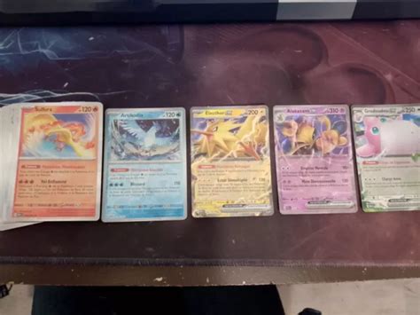 LOT DE 20 cartes pokémon HOLO 3 cartes EX 1 REVERSE EV3 5 MEW 151