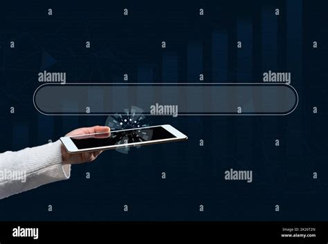 A Female Hand Holds A Tablet Over The Information Search Input Line