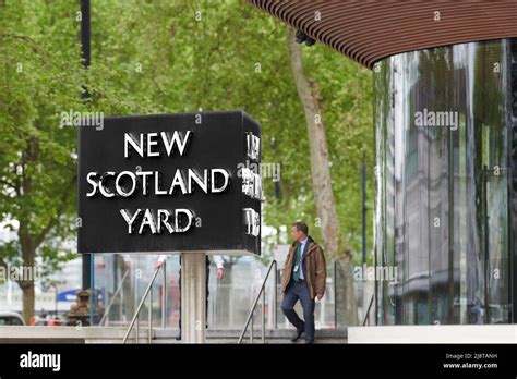 Police Officer Outside New Scotland Yard Headquarters Of The