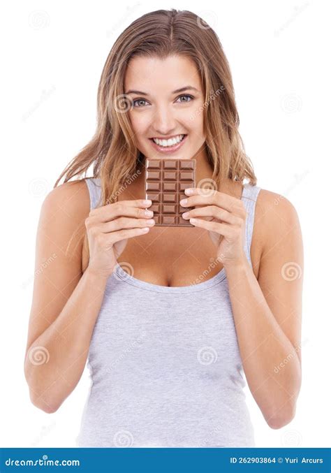 Chocolate Is One Of My Vices An Attractive Young Woman Eating A Slab
