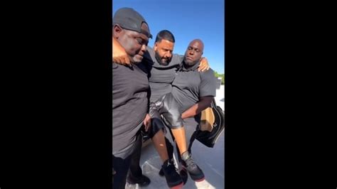 Dj Khaled Makes Security Guards Carry Him To Keep Sneakers Clean Faces