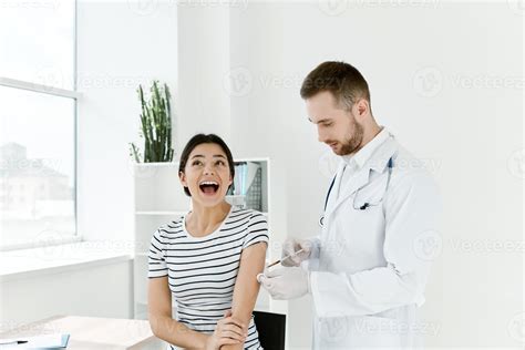 Woman Afraid Of Injections Fear Of Vaccination Treatment 21991991 Stock