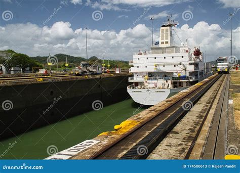 A Cargo Ship Crossing Panama Canal At Miraflores Lock In Panama City
