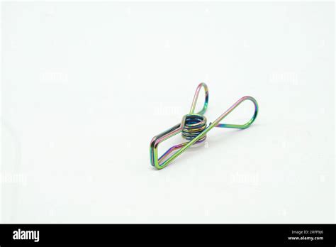 A Stainless Steel Clothes Peg Isolated On A White Background Stock