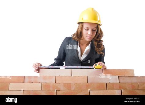 Woman Builder Measuring Isolated On The White Stock Photo Alamy