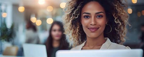 Premium Photo Collaborating On A Laptop Diverse Female Colleagues In A Modern Corporate