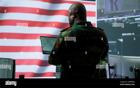 Team Of Military Experts Operates High Tech Computers And Tablet To Analyze Surveillance Data